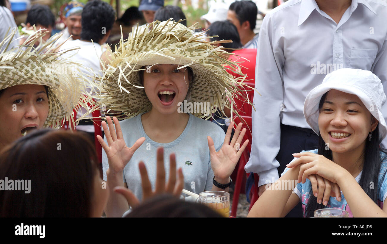Young Vietnamese enjoying themselves at a resort on an island off the ...
