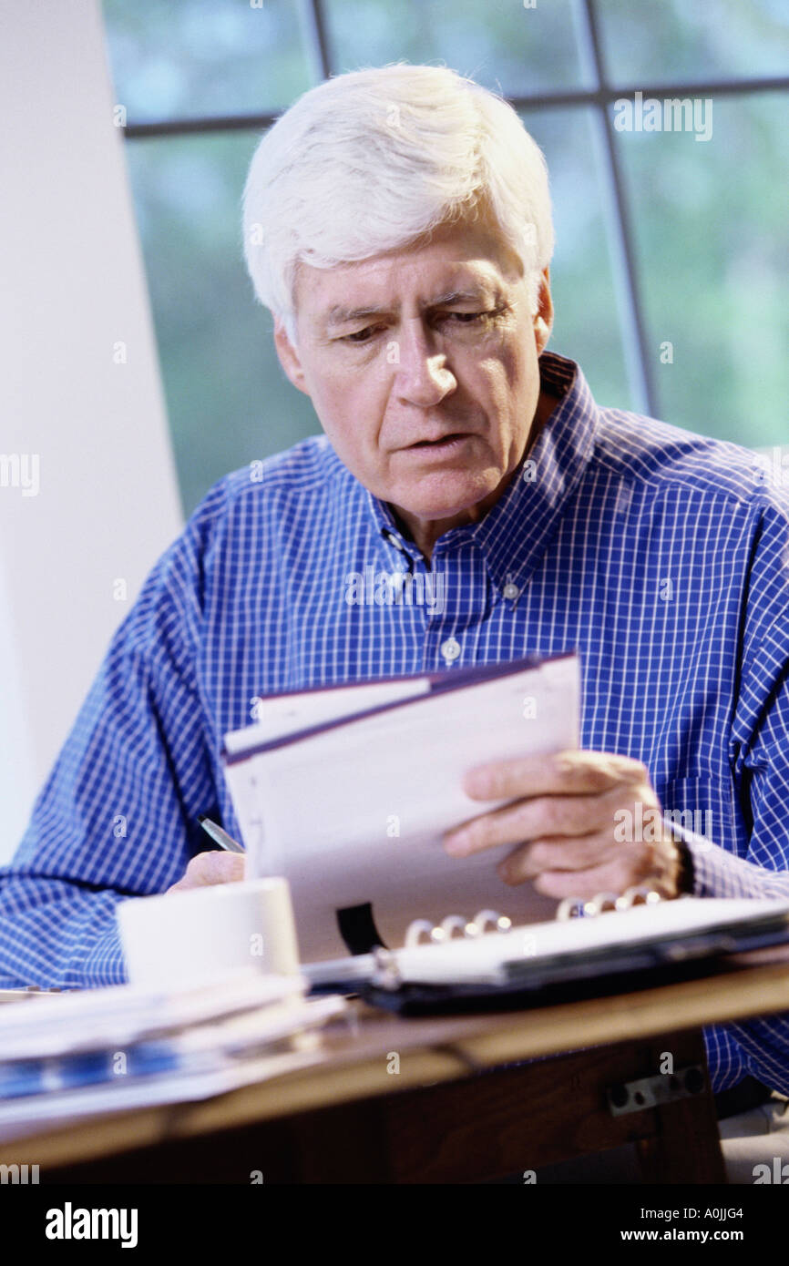 Man writing notebook table front view hi-res stock photography and ...