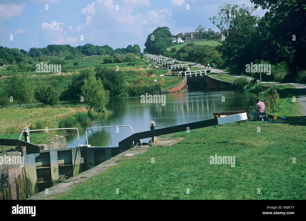 Flight of locks along canal at Devizes Stock Photo - Alamy
