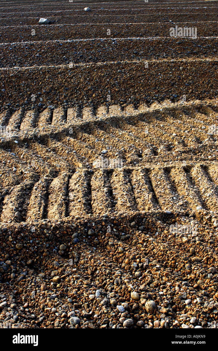 Tractor marks on pebble beach Stock Photo - Alamy