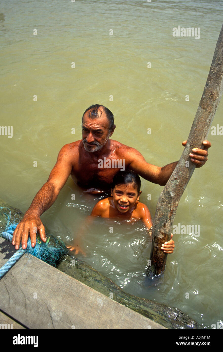 Brazilian man, Brazilian girl, grandfather and granddaughter swimming ...