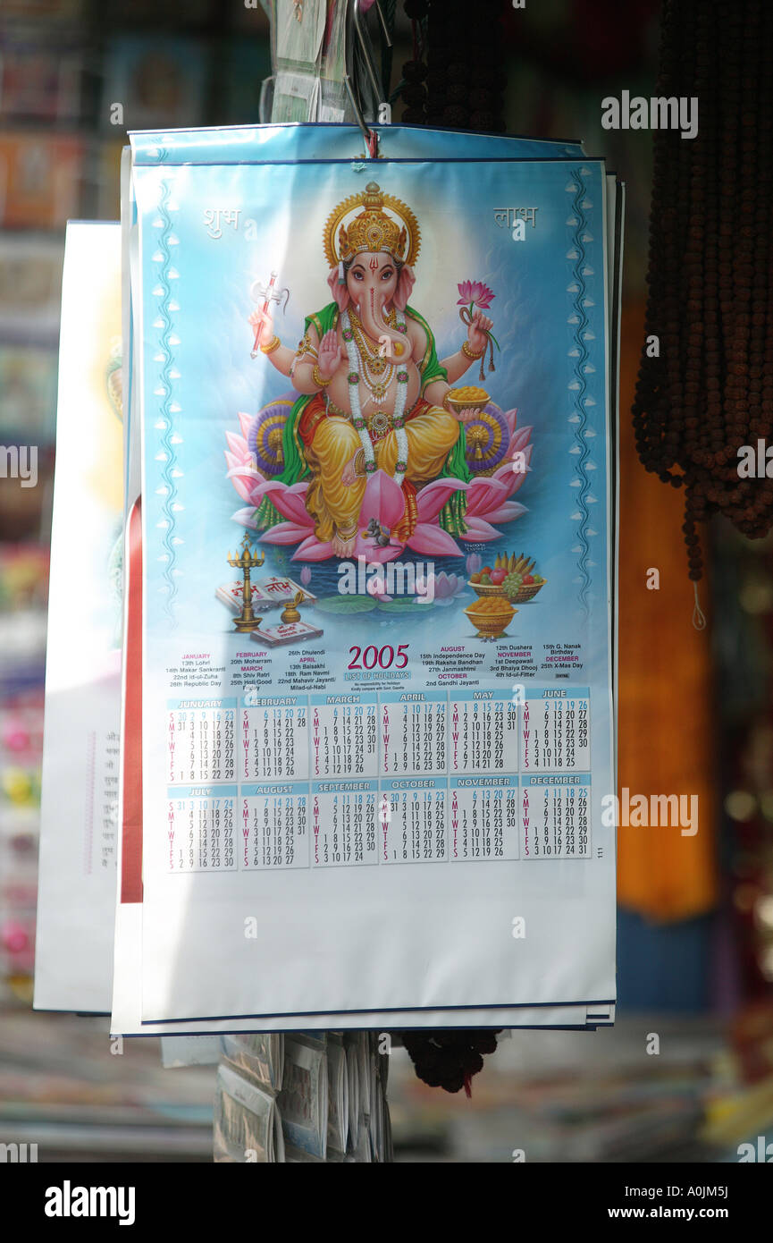 A close up view of a calendar showing a picture of the Hindu God ...