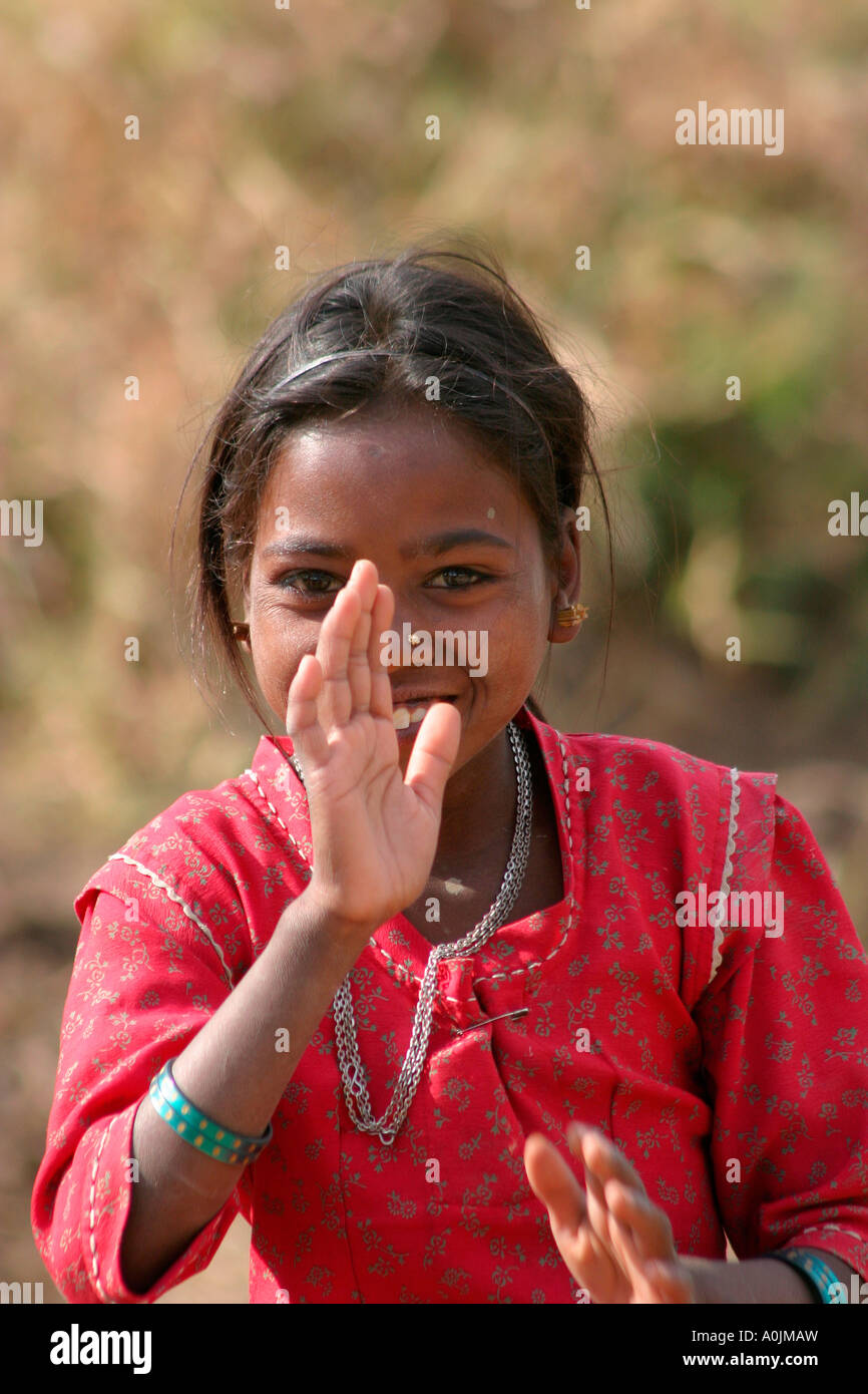 Rajasthani girl working at a Persian water wheel between Ranakpur and ...