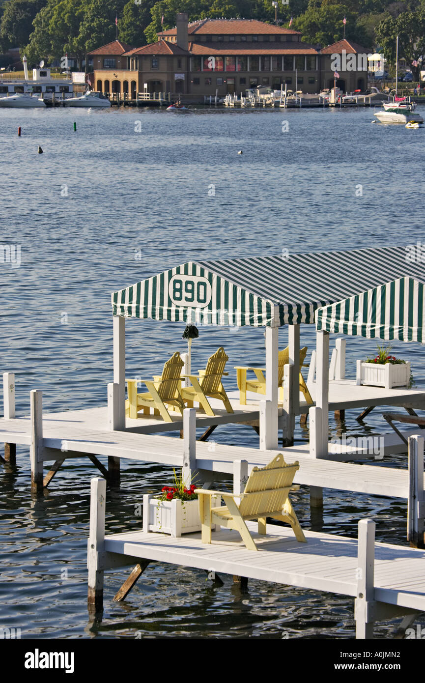 WISCONSIN Lake Geneva Private white boat docks with awnings and chairs ...
