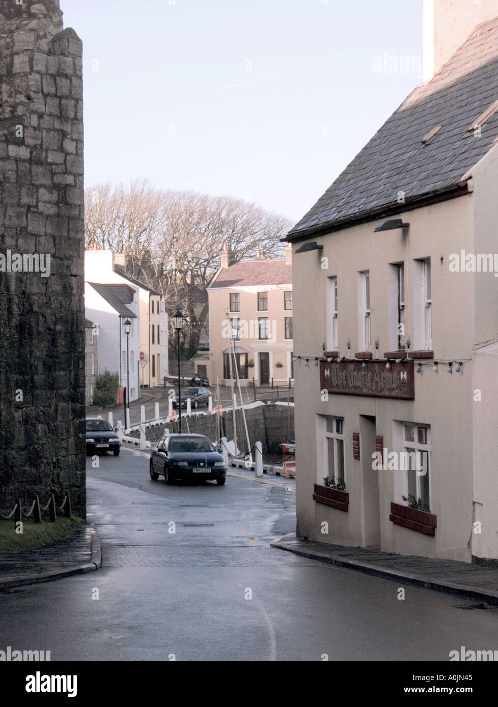 The narrow road past the Glue Pot pub in Castletown Stock Photo - Alamy
