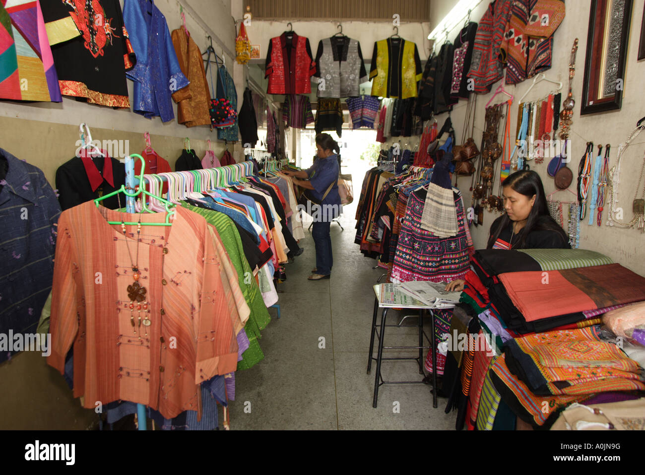 A silk clothes shop in Khorat North East Thailand The lady shopkeeper ...
