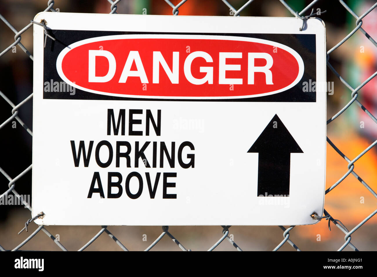 DANGER SIGN, MEN WORKING ABOVE Stock Photo - Alamy