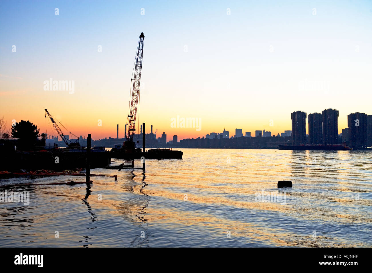 CONSTRUCTION CRANE IN THE SUNSET Stock Photo - Alamy