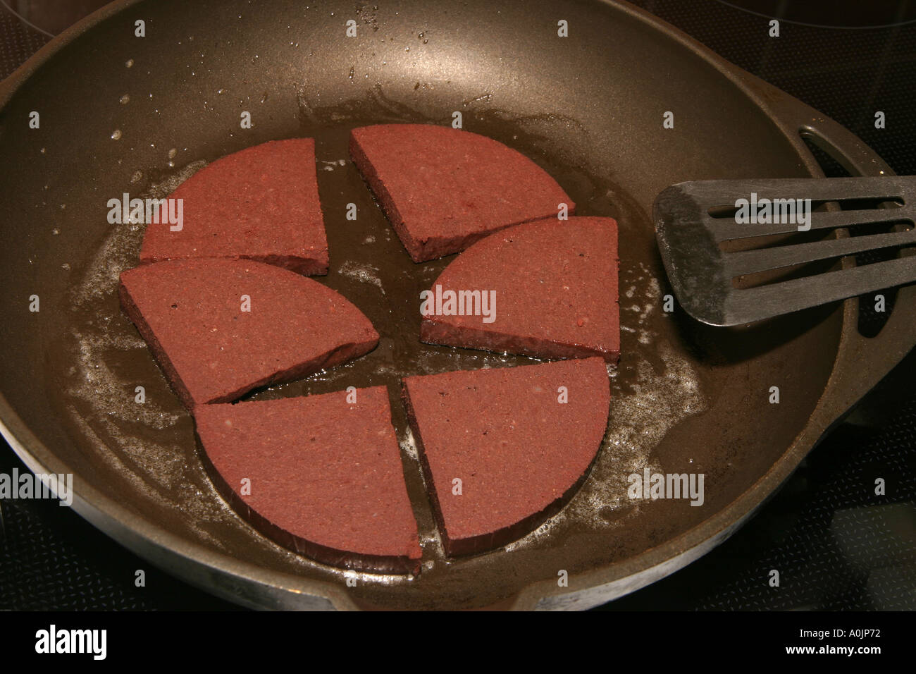 Blood pudding, traditional Swedish food, here fried in a pan Stock ...