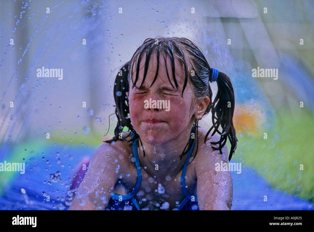 Children water slide splash hi-res stock photography and images - Alamy
