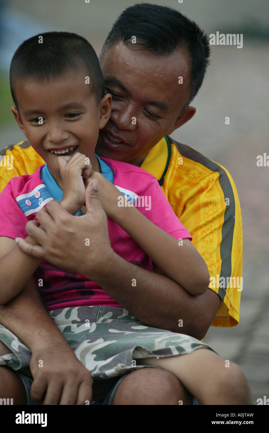 A father and son in Chiang Mai North East Thailand Stock Photo - Alamy