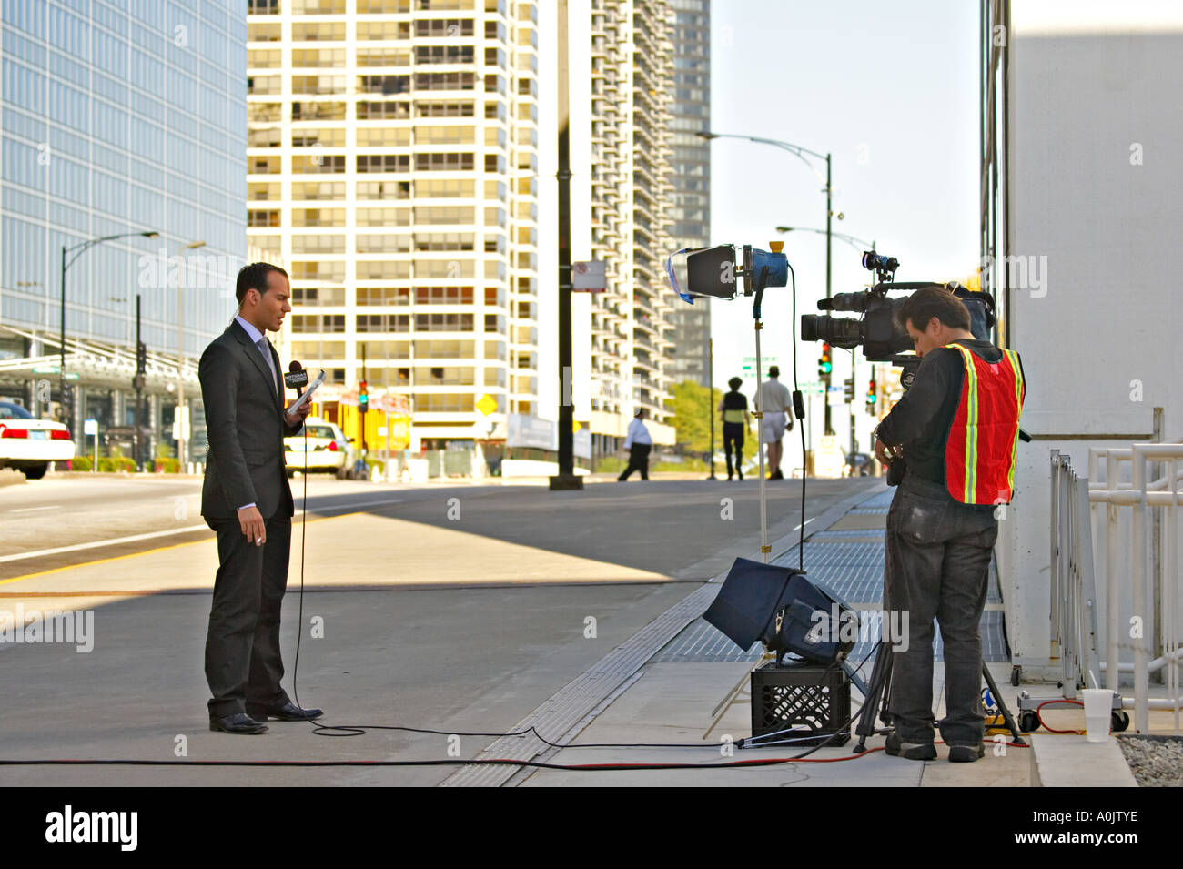 STREET SCENE Chicago Illinois Spanish language male news reporter with ...