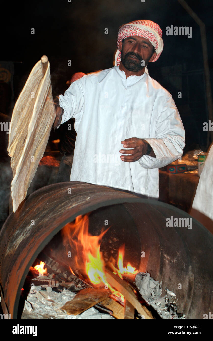 Bedouin Cooking Arabic Bread Stock Photo - Alamy