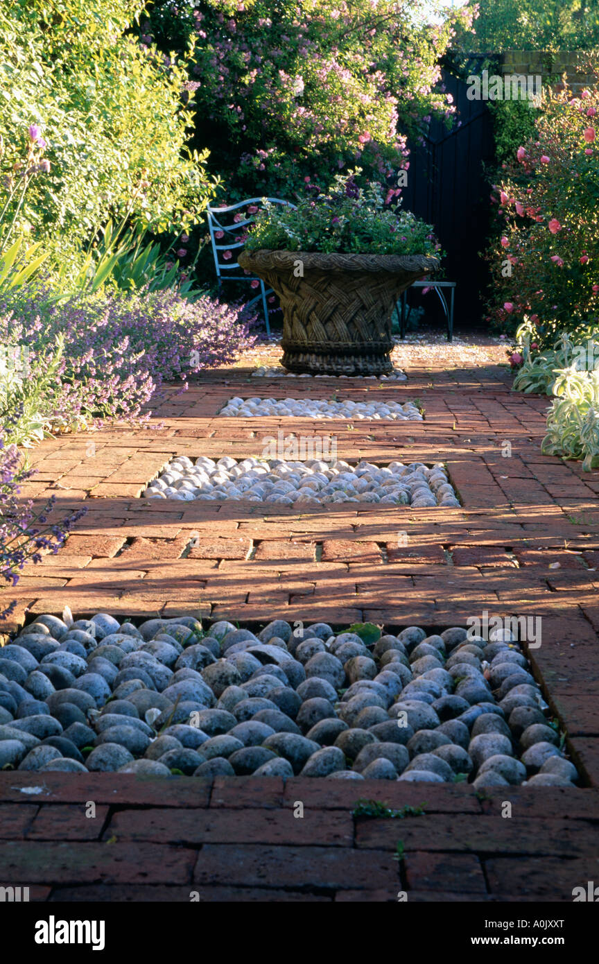 Pebble and brick path Stock Photo - Alamy