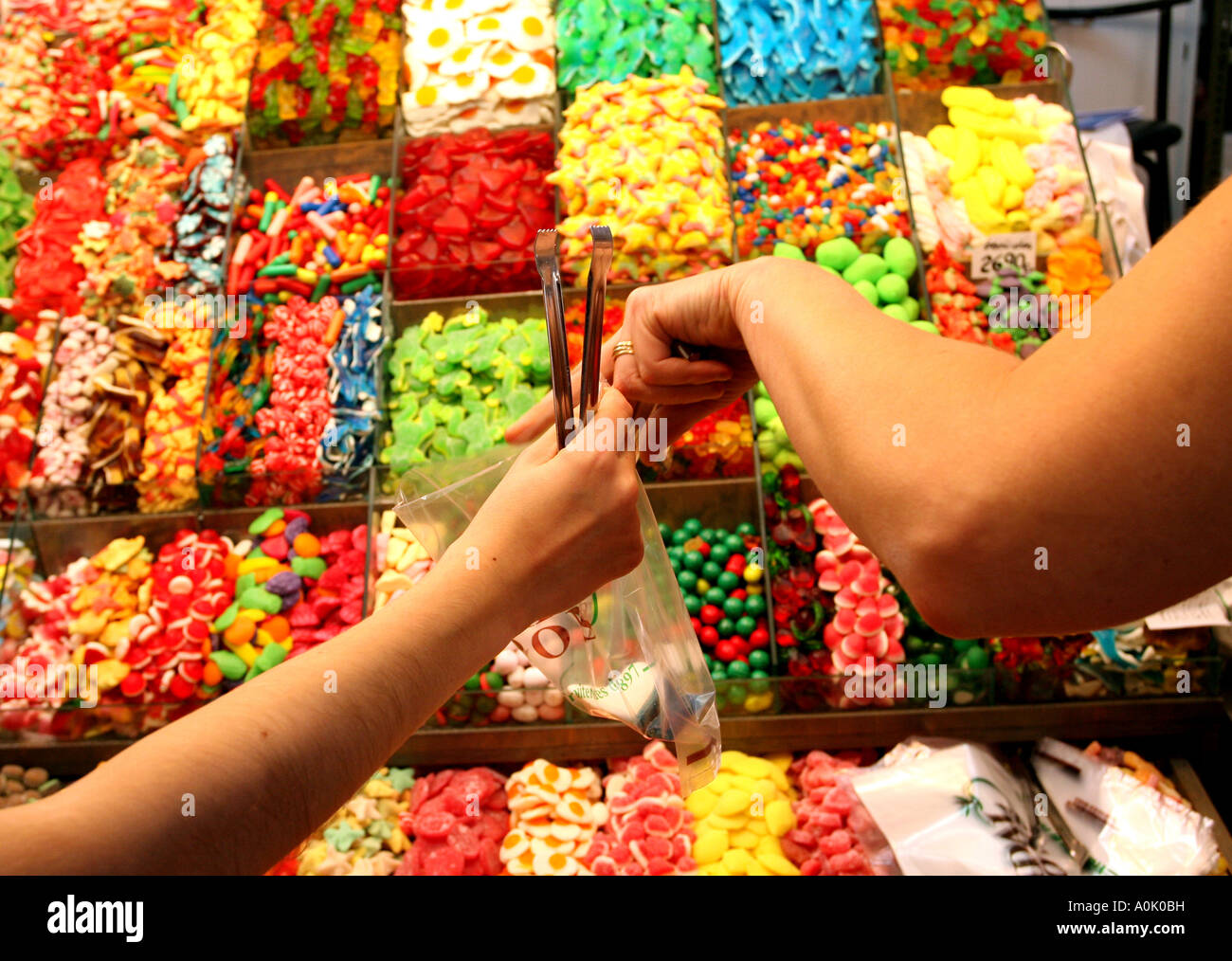 Sweets on a stall in a market in Barcelona Spain Stock Photo - Alamy
