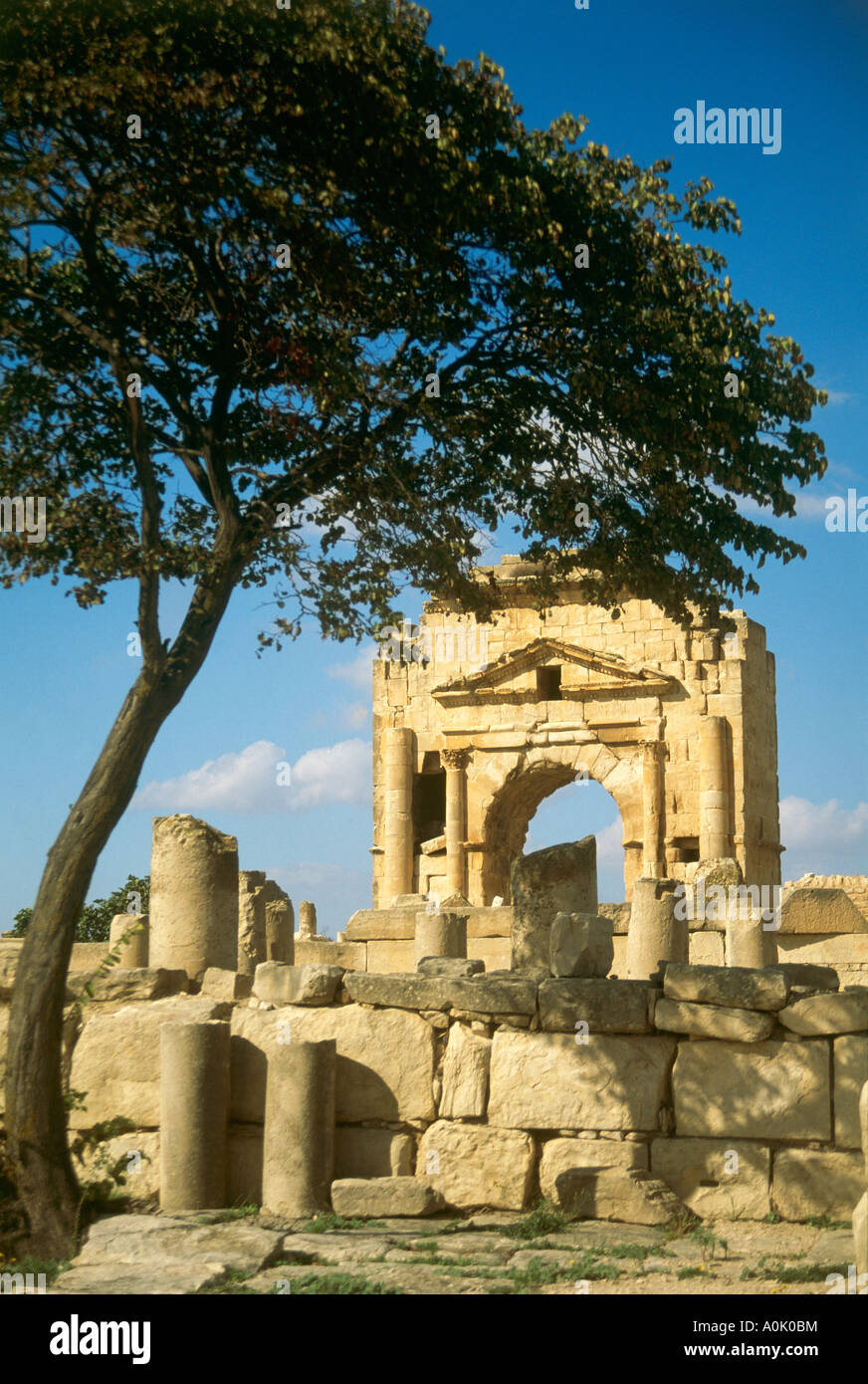 The sunshine gleaming on the great triumphal arch built around 115 AD ...
