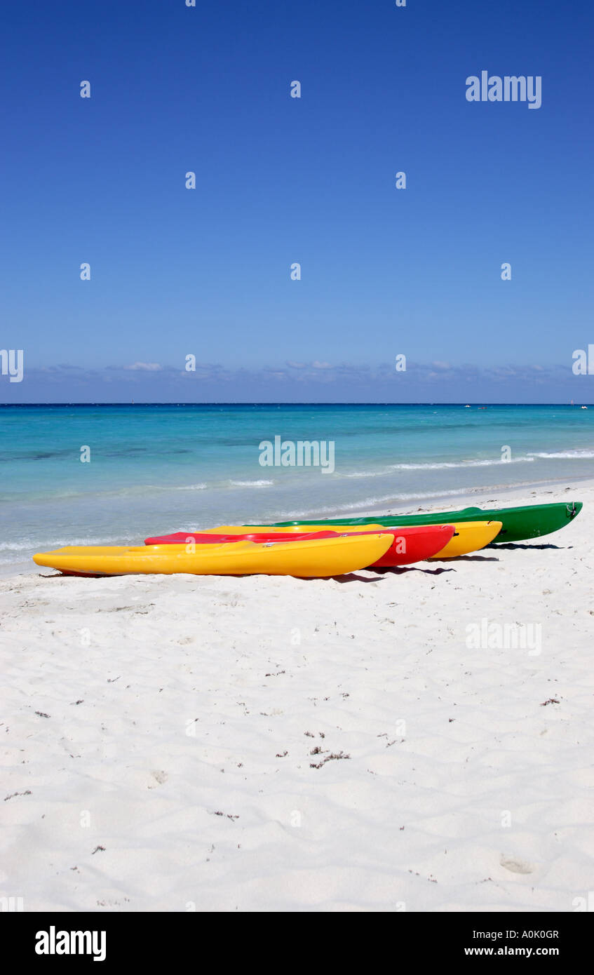 Canoes on a Caribbean Beach Stock Photo - Alamy