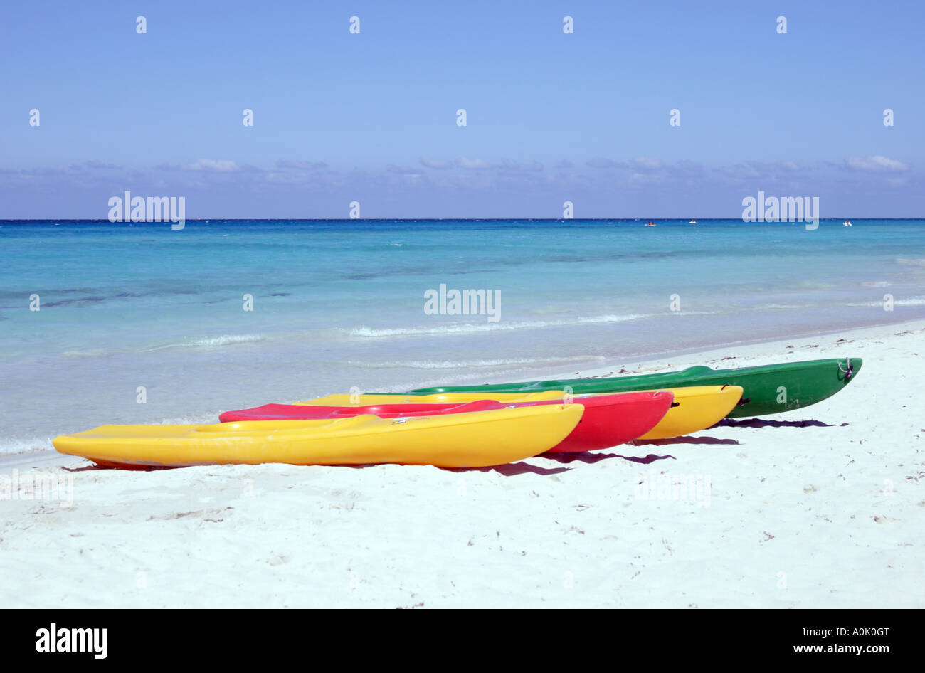 Canoes on a Caribbean Beach Stock Photo - Alamy