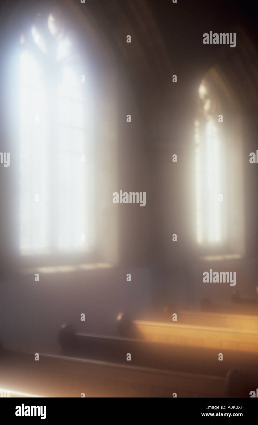 Atmospheric diffused light from ancient church windows shining down on ...
