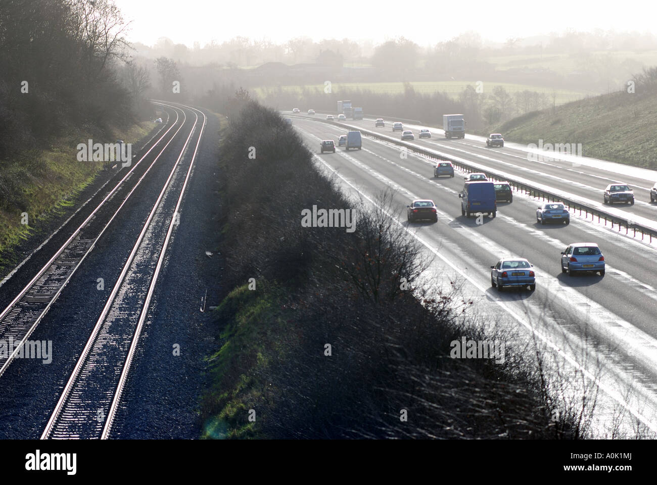 Rail road alongside highway vehicles hi-res stock photography and ...