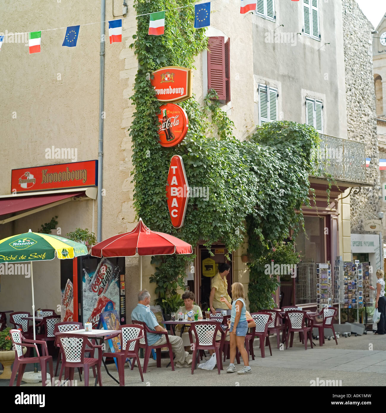 Street cafe terrace, people, tobacconist shop, red signs, Sault ...
