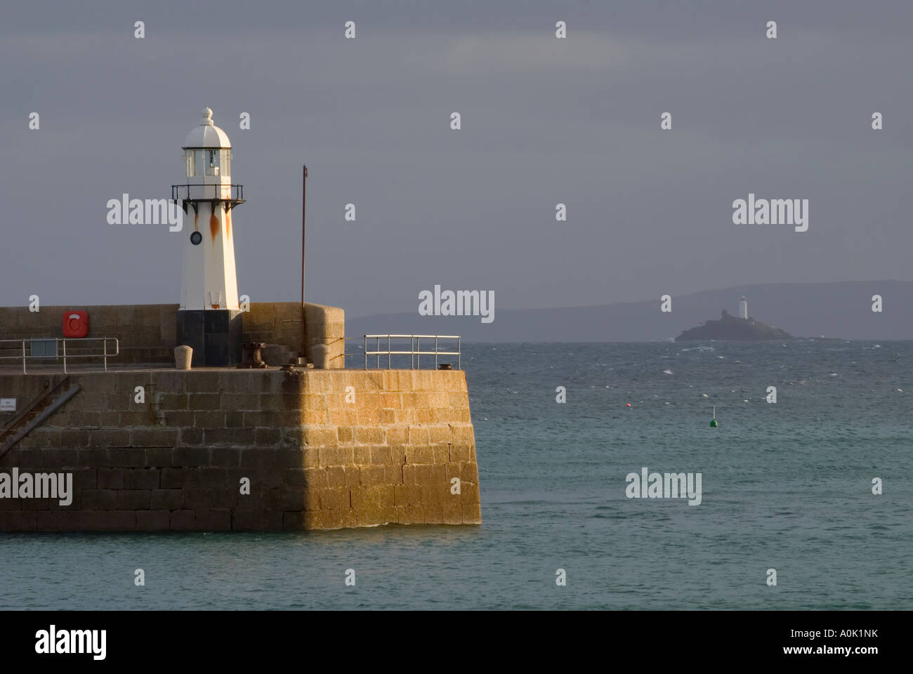 Smeaton Pier Lighthouse at St. Ives Harbour, Cornwall, England. Godrevy ...