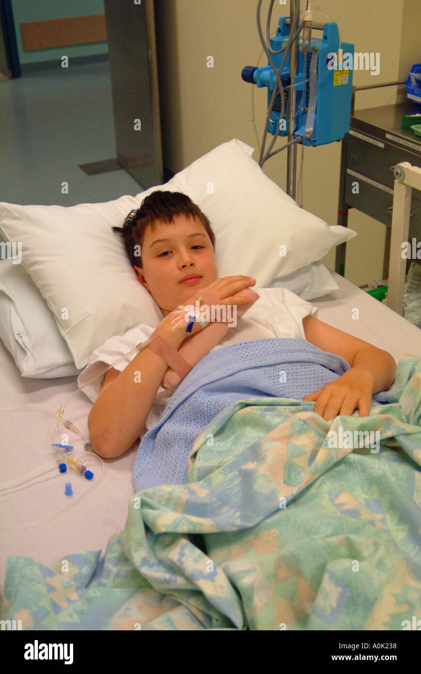 Child waiting outside operating theatre for surgery on his hand Stock ...
