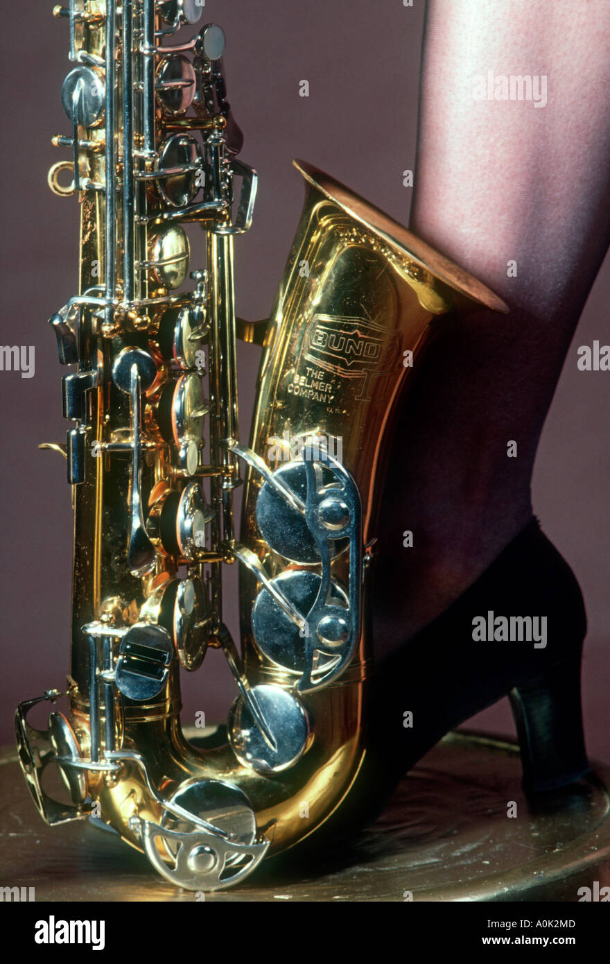 saxophone and leg Stock Photo - Alamy
