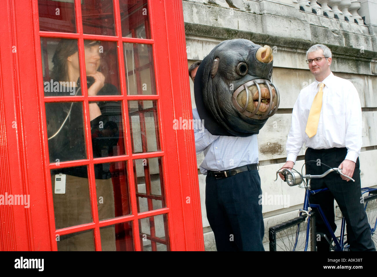 A queue outside at red telephone box in London England Stock Photo - Alamy