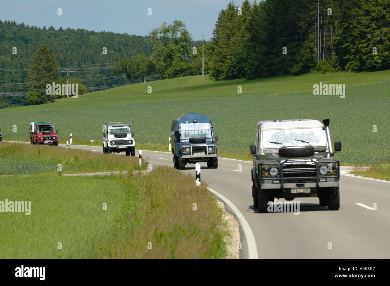 Germany Schwaebische Alb various Land Rover Defender on the road Stock ...