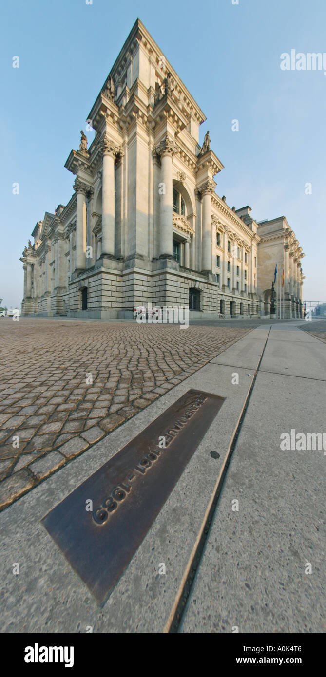 A sign in the pavement next to the Reichstag stands as a reminder for ...