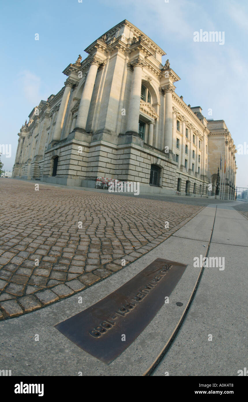 A sign in the pavement next to the Reichstag stands as a reminder for ...