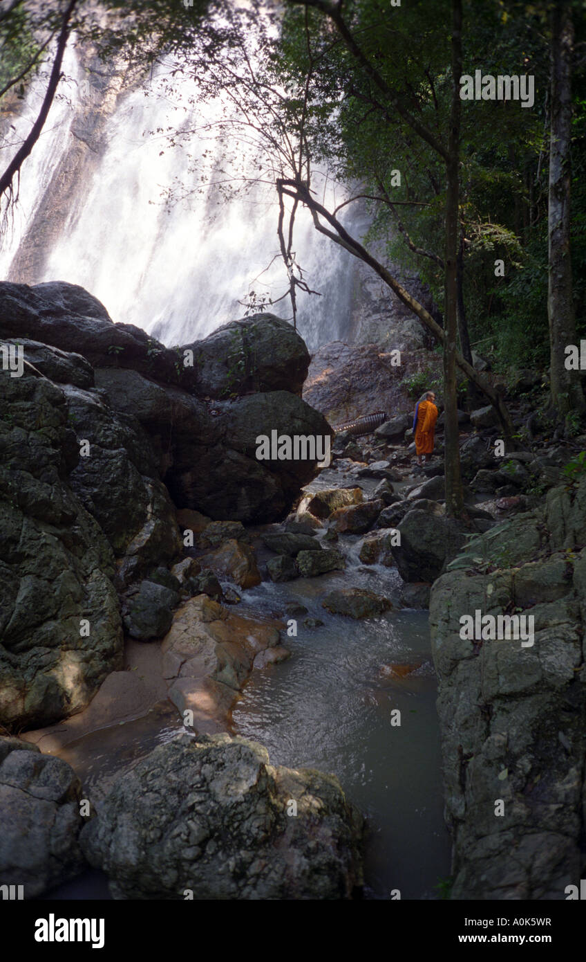 Buddhist monk walking along river hi-res stock photography and images ...