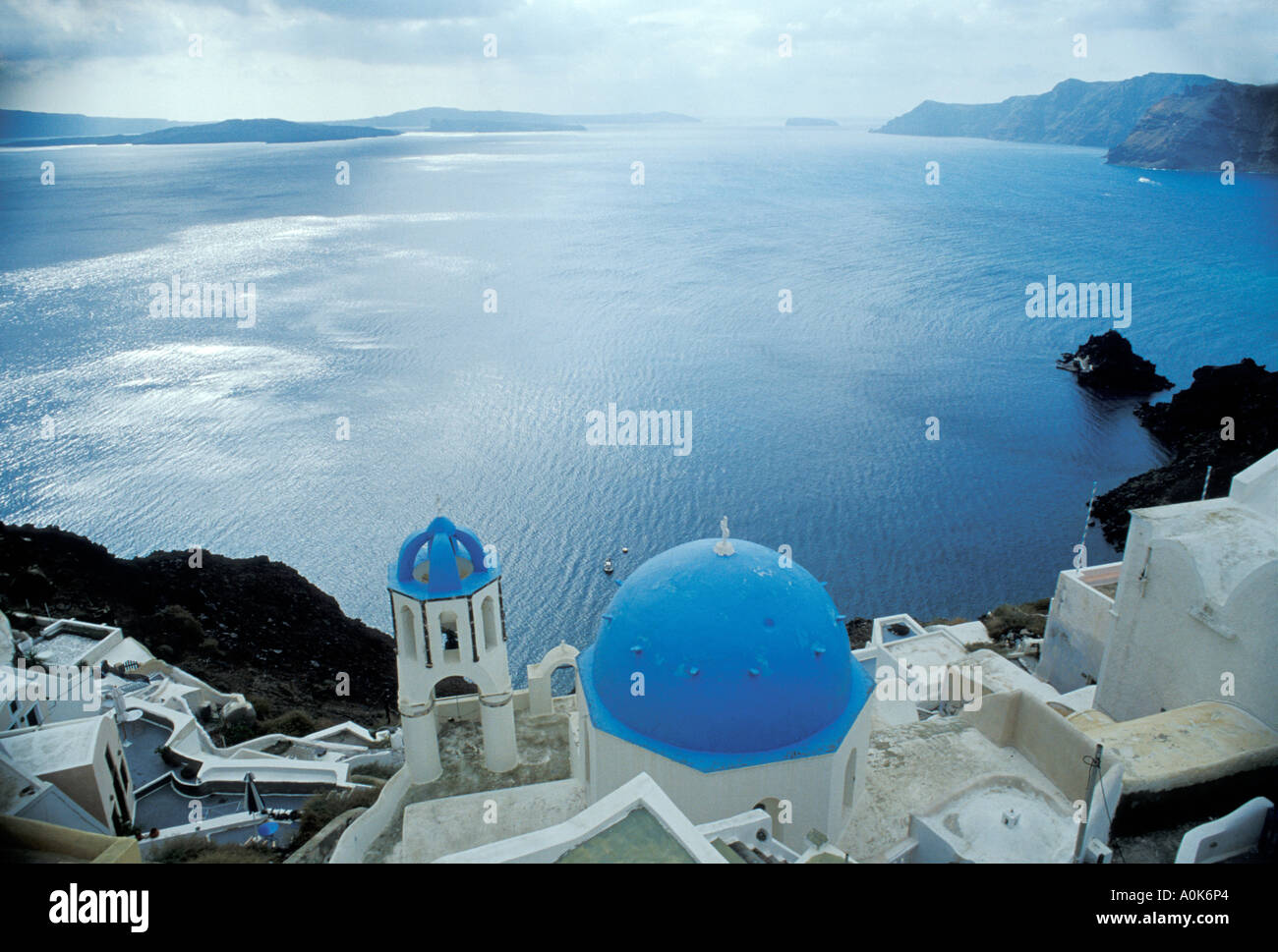 Santorini hillside and blue domed church, Santorini, Greek Islands ...
