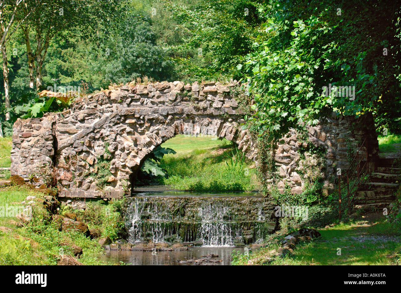 THE UGLY BRIDGE AT CASTLE HILL HOUSE AND GARDENS DEVON UK Stock Photo ...