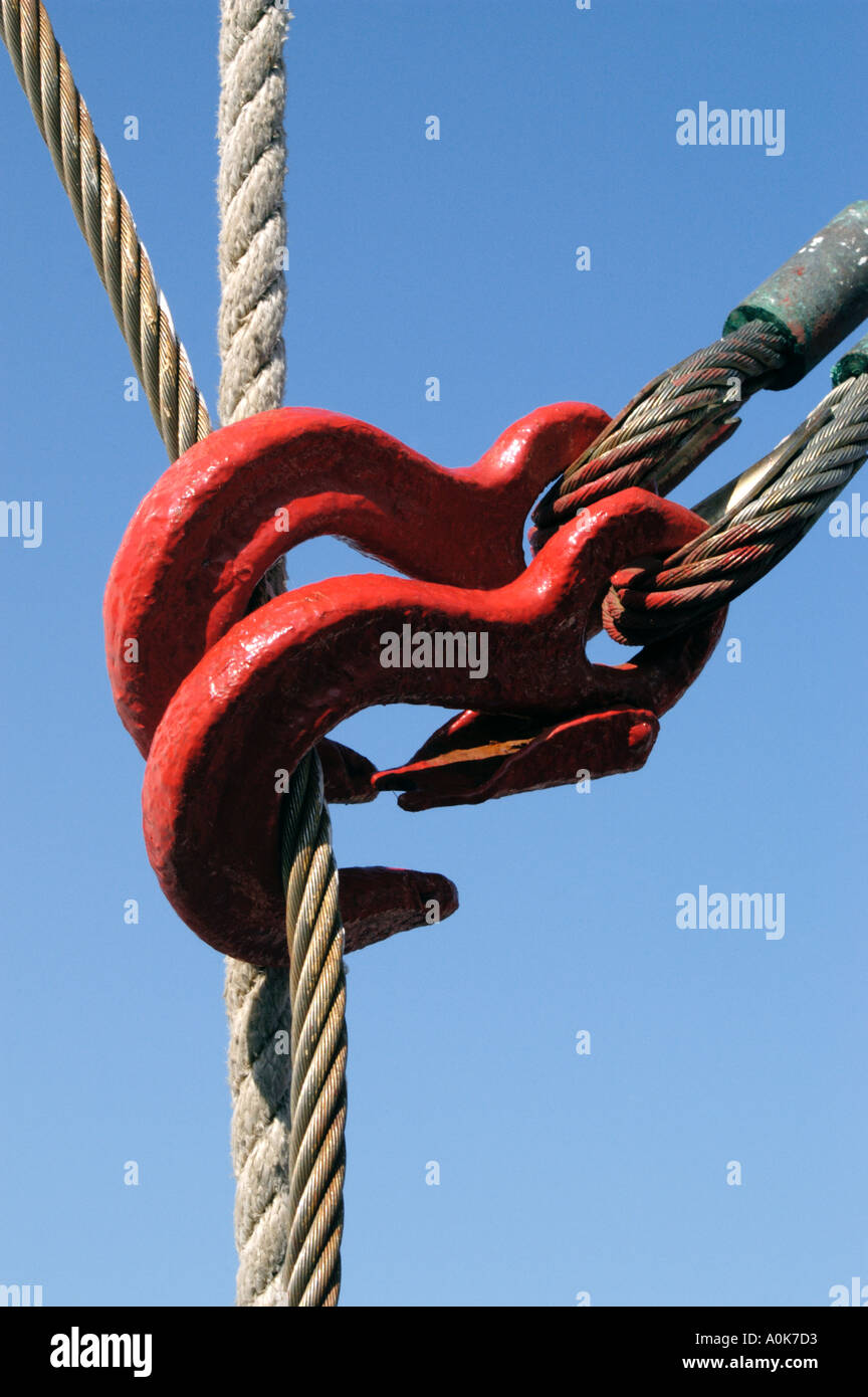 Two hooks holding a rope Stock Photo - Alamy