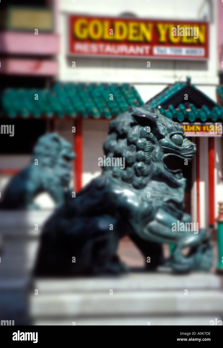 Lion monument at the foot of the Chinese Arch in Chinatown Liverpool ...