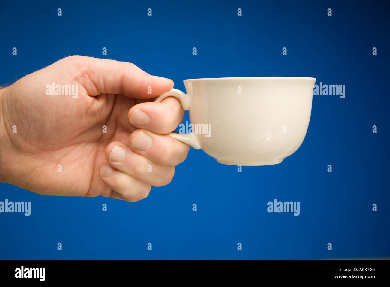 hand holding cup Stock Photo - Alamy