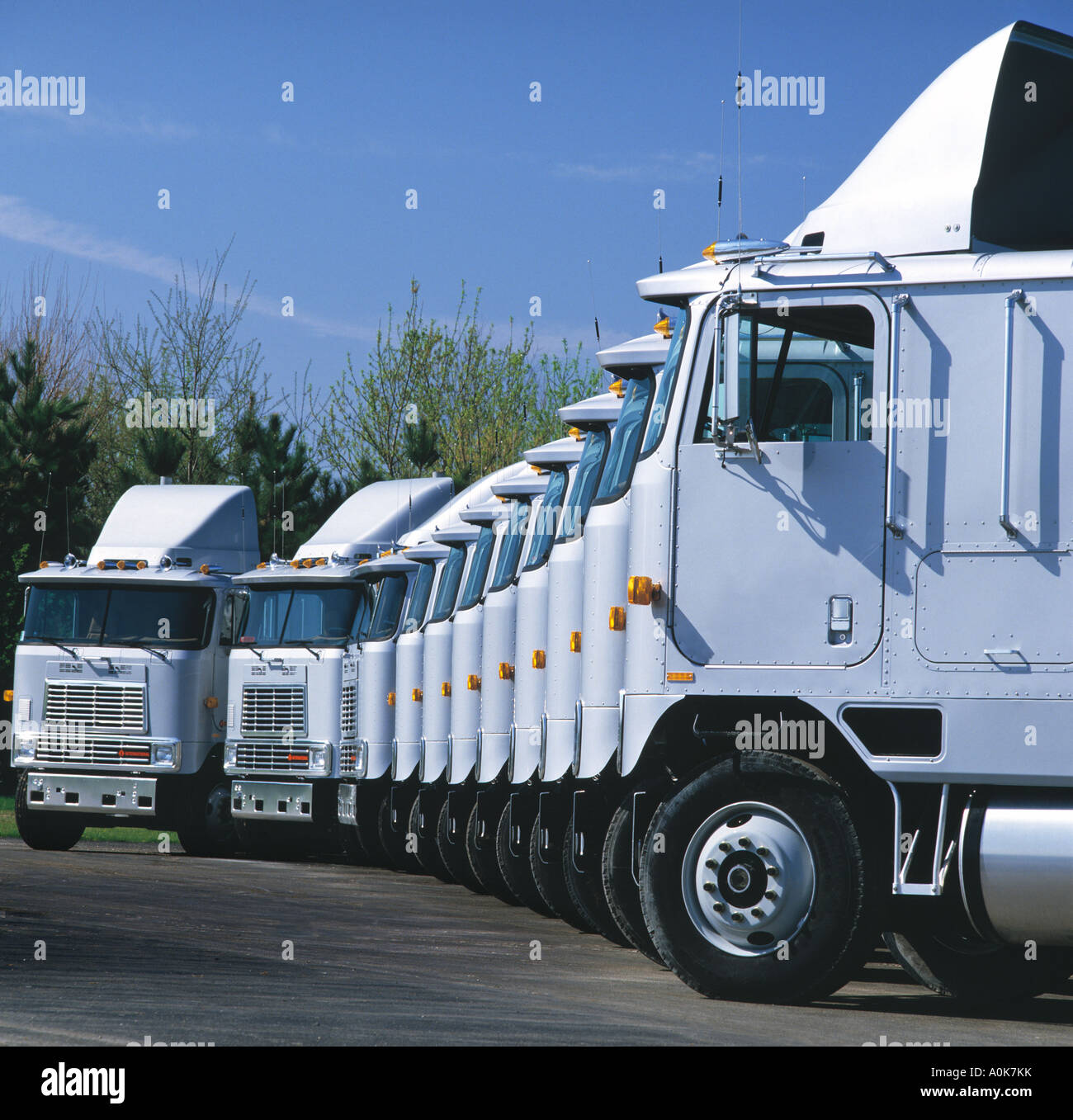 A row of silver trucks Stock Photo - Alamy