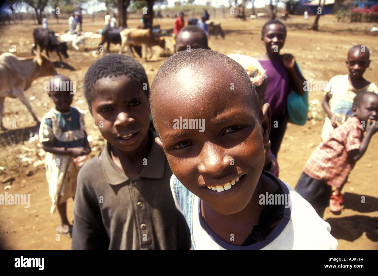 Happy Meru children on the side of a dirt road in Meru District Kenya ...
