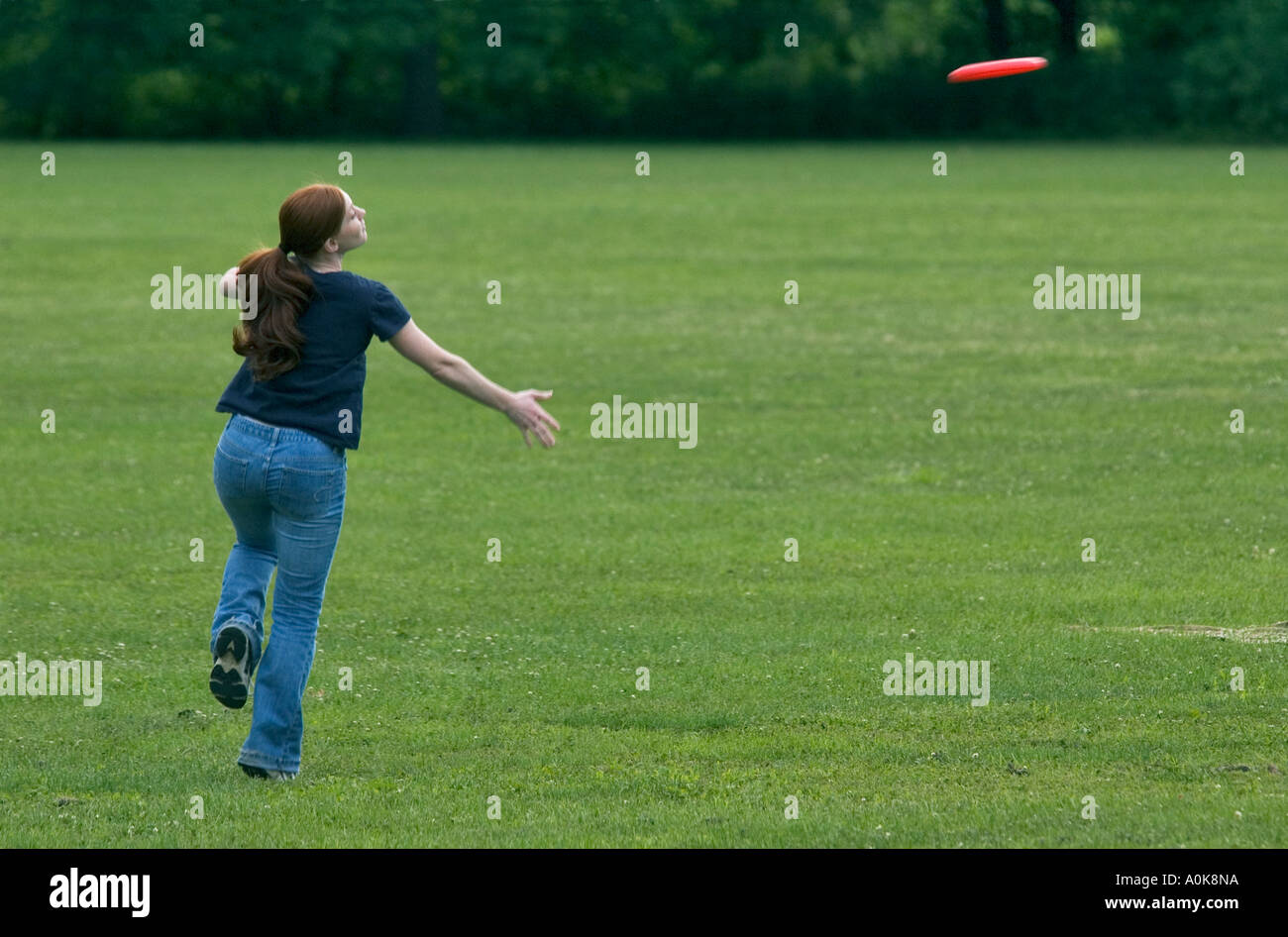 Girl Tossing Frisbee In Park Cherokee Park Louisville Kentucky Stock ...