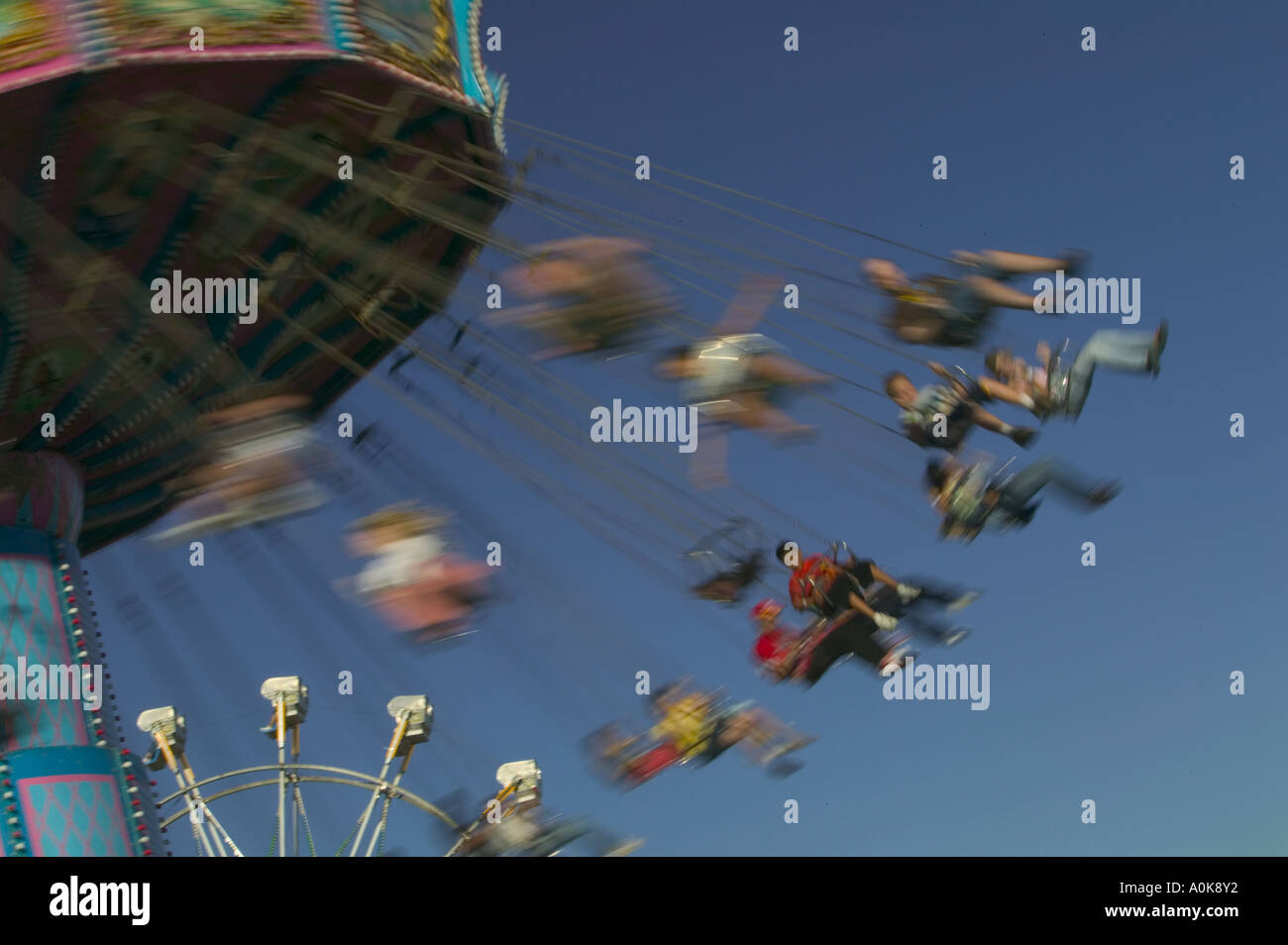 Swing ride at the fair Stock Photo - Alamy