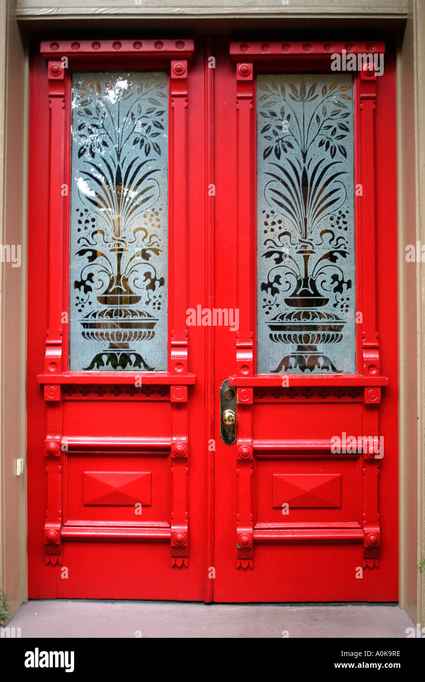 Red doors with designed glass Stock Photo - Alamy