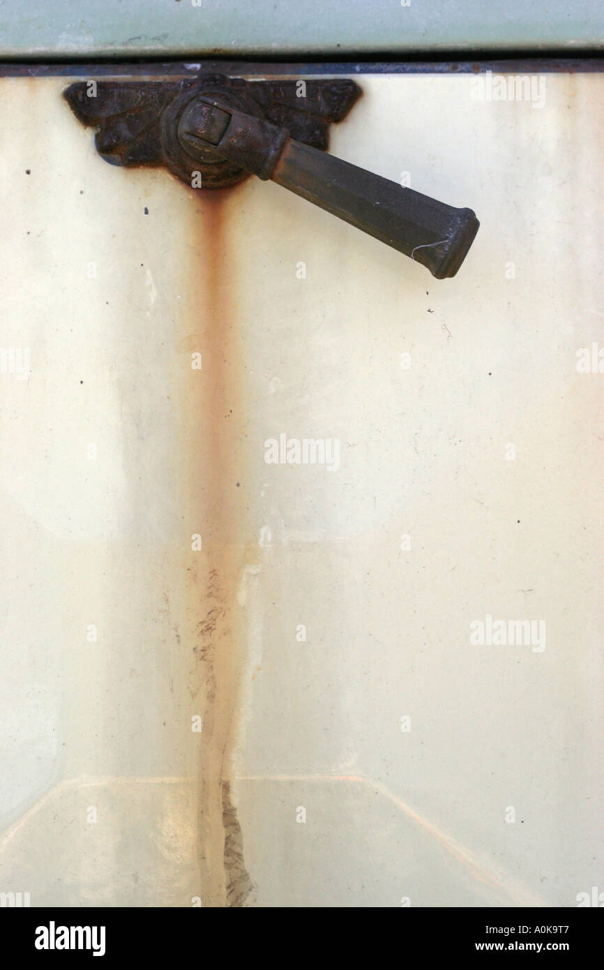 Enamal stove front rusting Stock Photo - Alamy