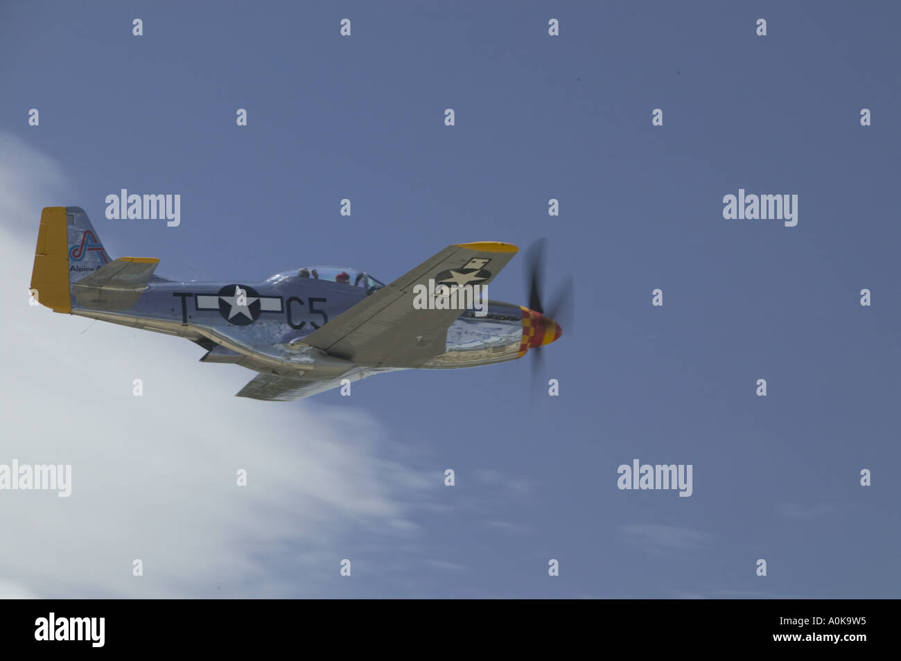 Silver North American P51 Mustang in flight profile Stock Photo - Alamy