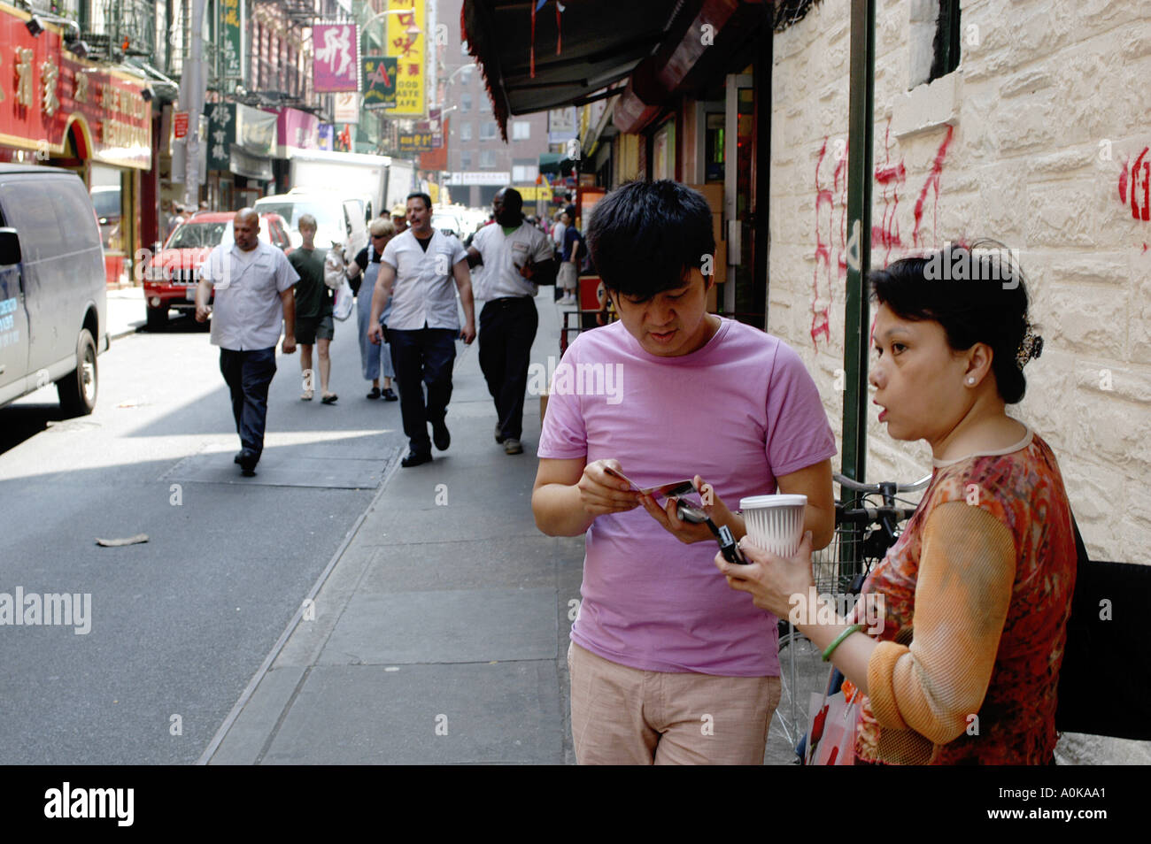Chinese people in the streets of Chinatown in downtown Manhattan New ...