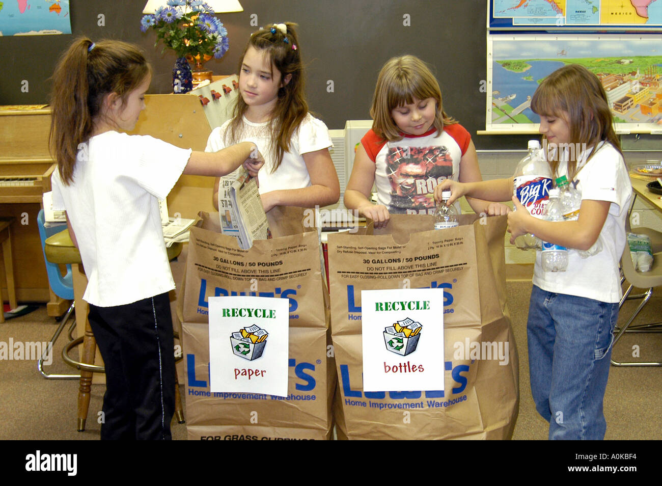 3rd Third Grade Students Recycle Bottles and Paper Stock Photo - Alamy