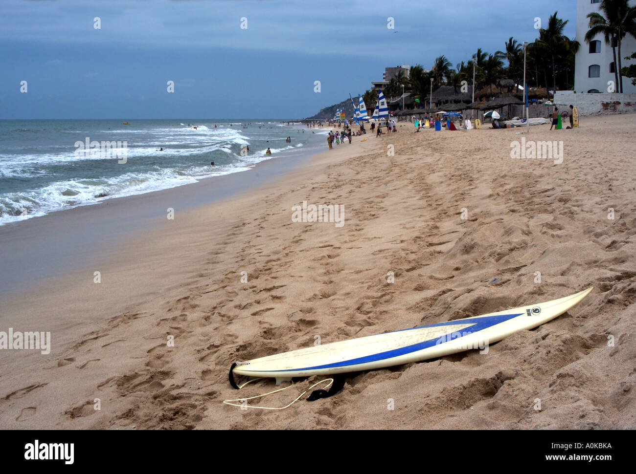 Busy beach scene with sailboats and parasailer Golden Zone Mazatlan ...
