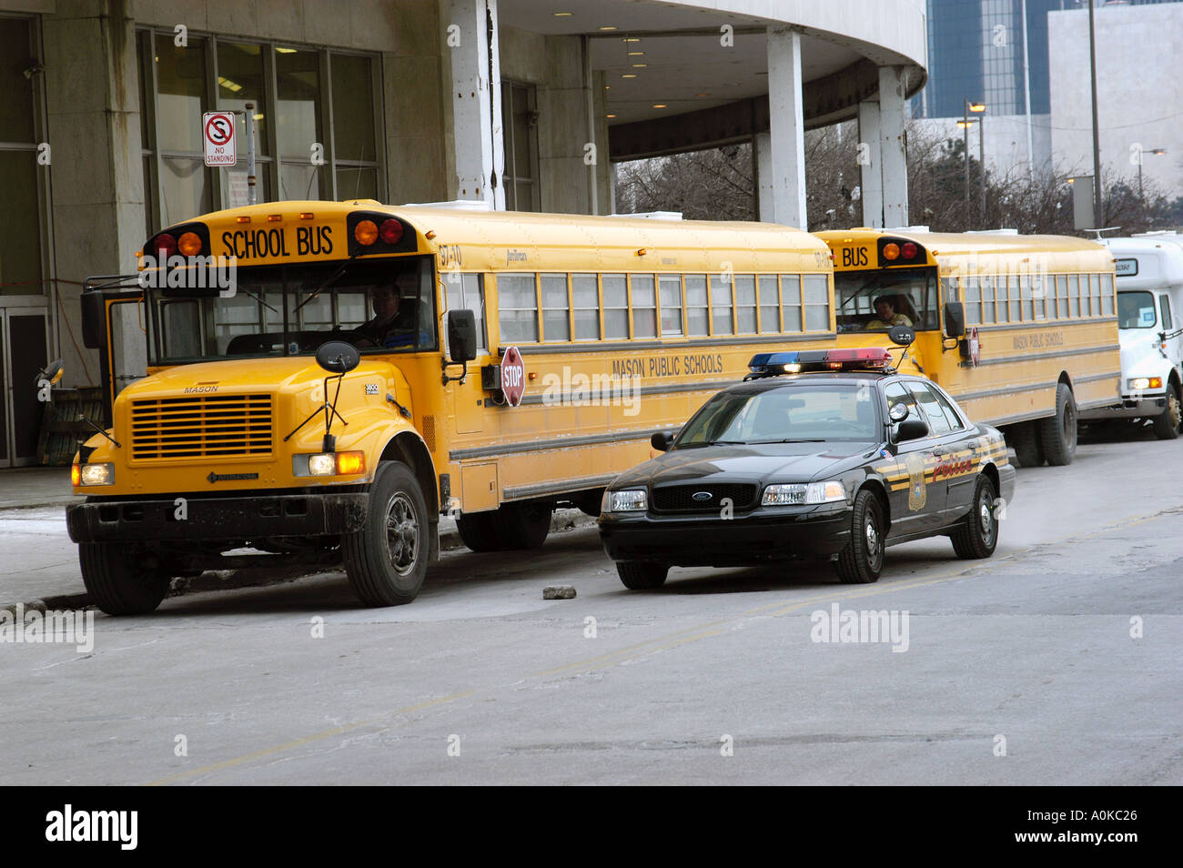 Police Cars Stops Two School Busses to Investigate Problems Stock Photo ...