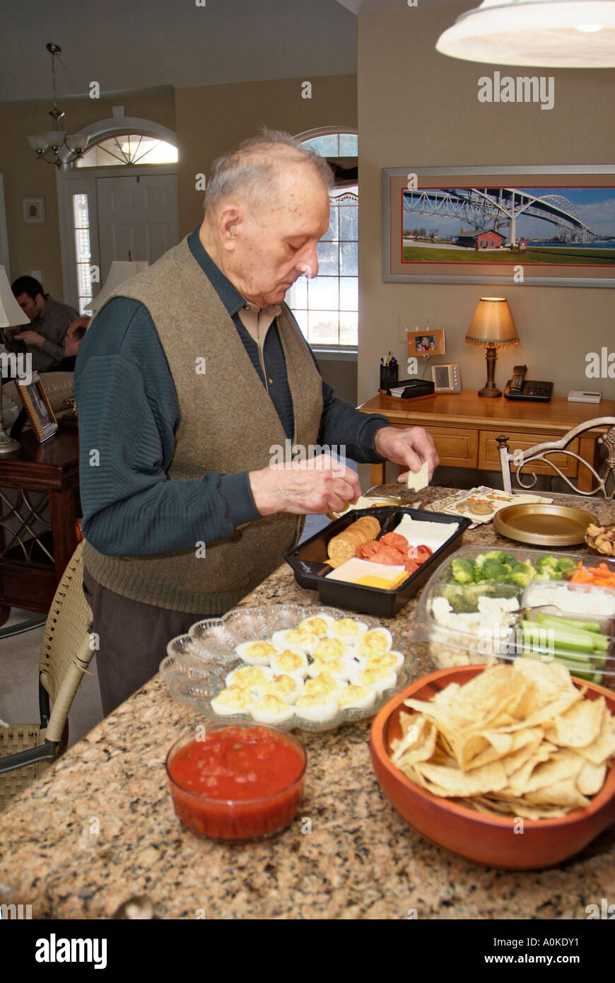 88 year old male eats a snack of cheese crackers vegetables eggs and ...